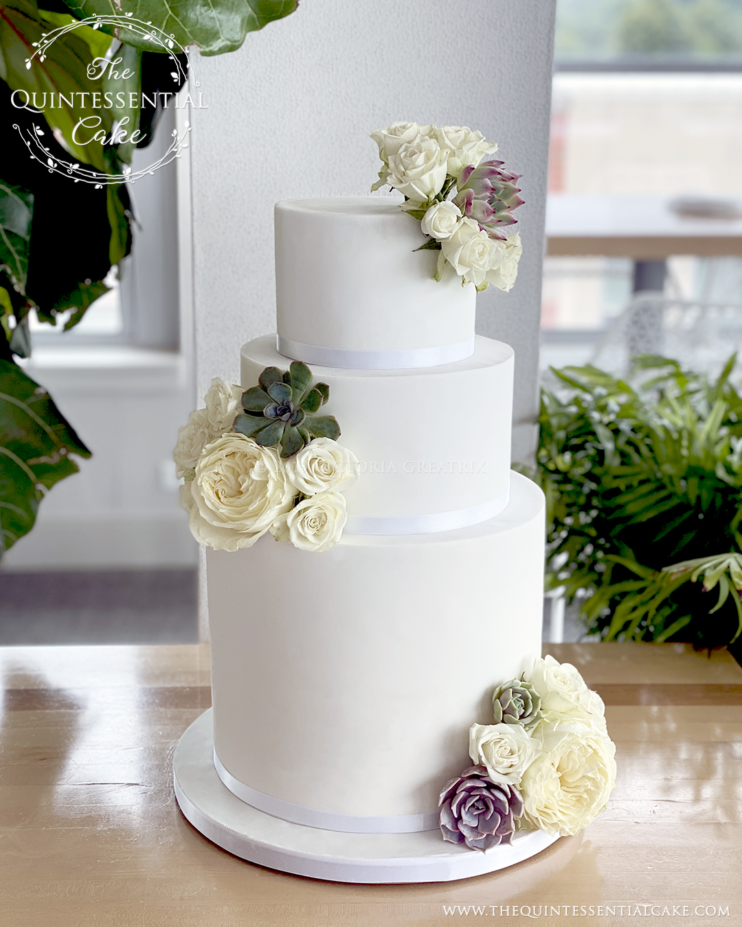 White Wedding Cake with Roses & Succulents | The Quintessential Cake ...